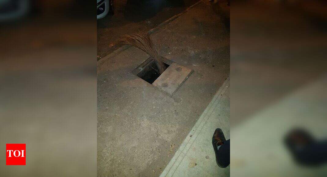 manhole cover missing - Times of India