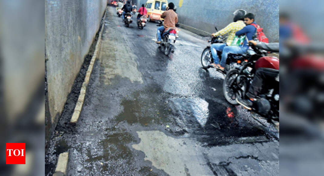 Pune: Two-wheelers slip & skid on wet Swargate underpass | Pune News ...