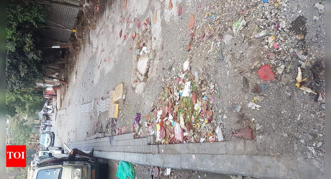 School compound as a garbage dump and urinal - Times of India
