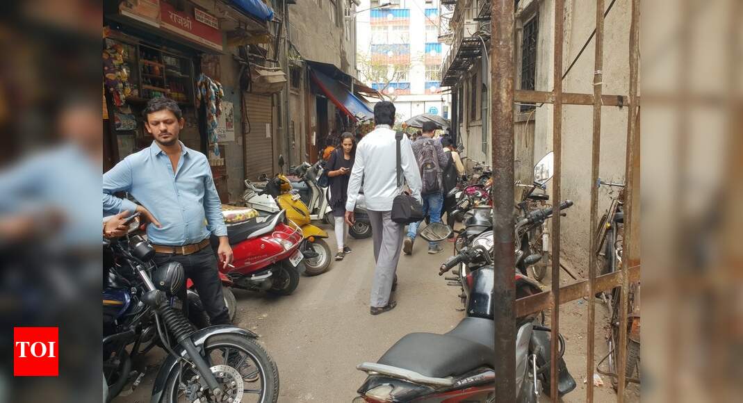 narrow lane is further narrowed - Times of India