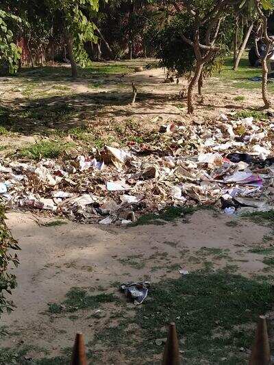 Trash left unpicked in tussle of depts - Times of India