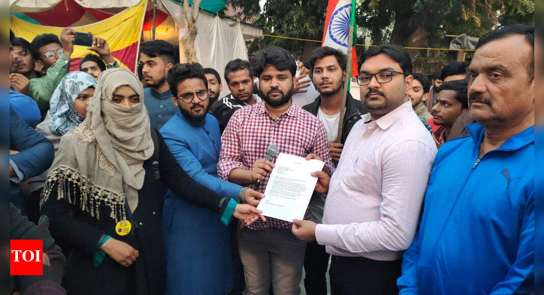 AMU students stage protest march against police action on anti-CAA ...