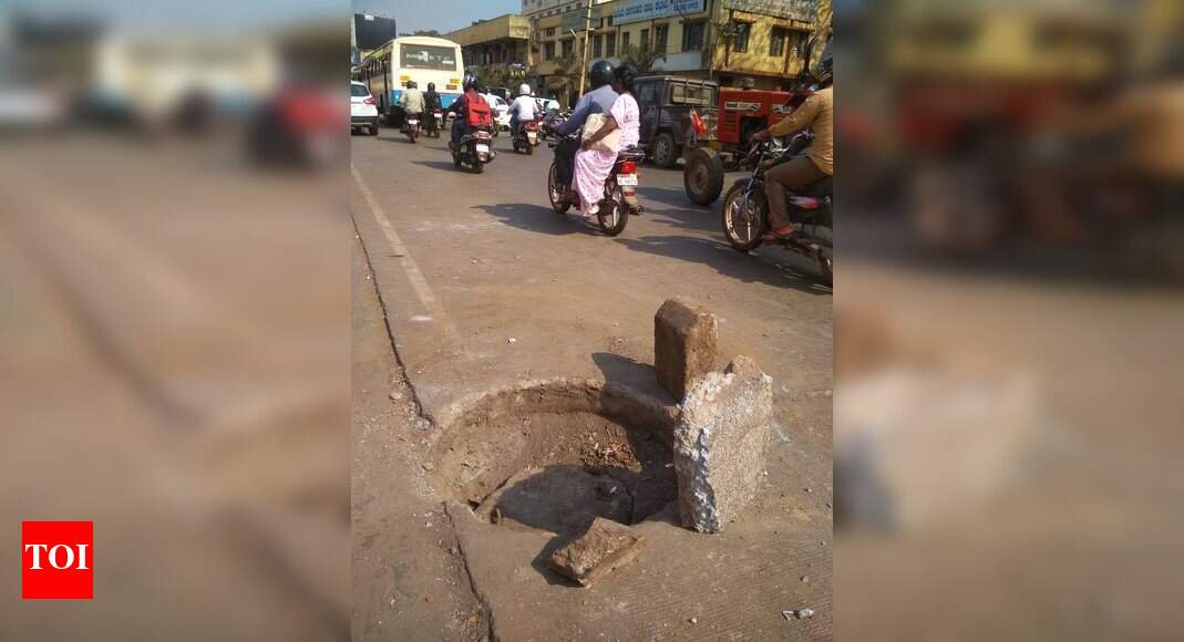 manhole open - Times of India