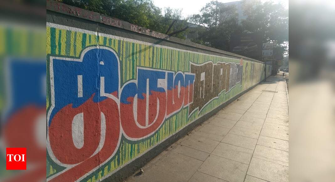 Defacing walls - Times of India