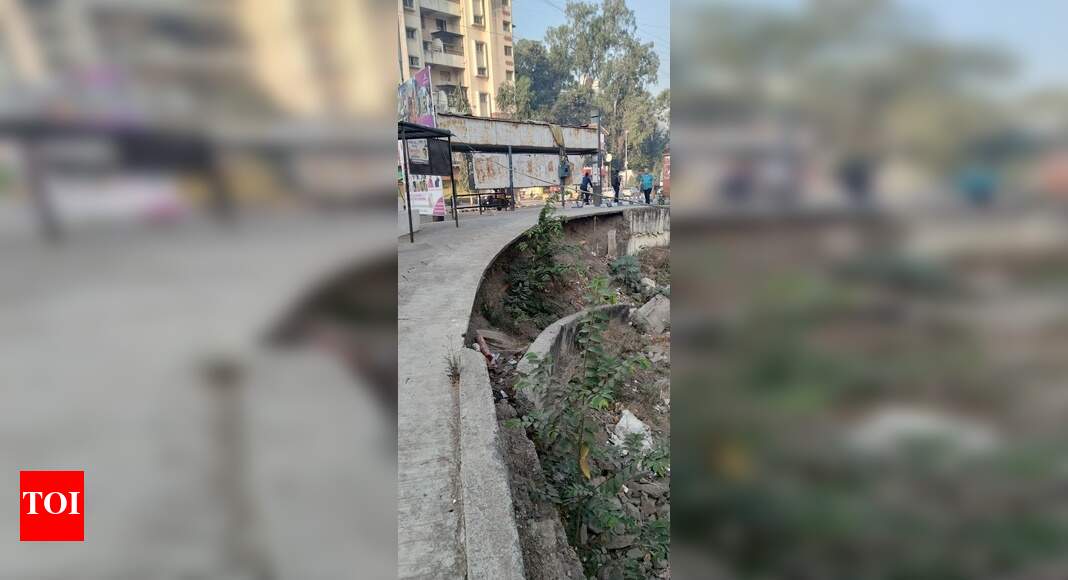 Unsafe condition of footpath - Times of India