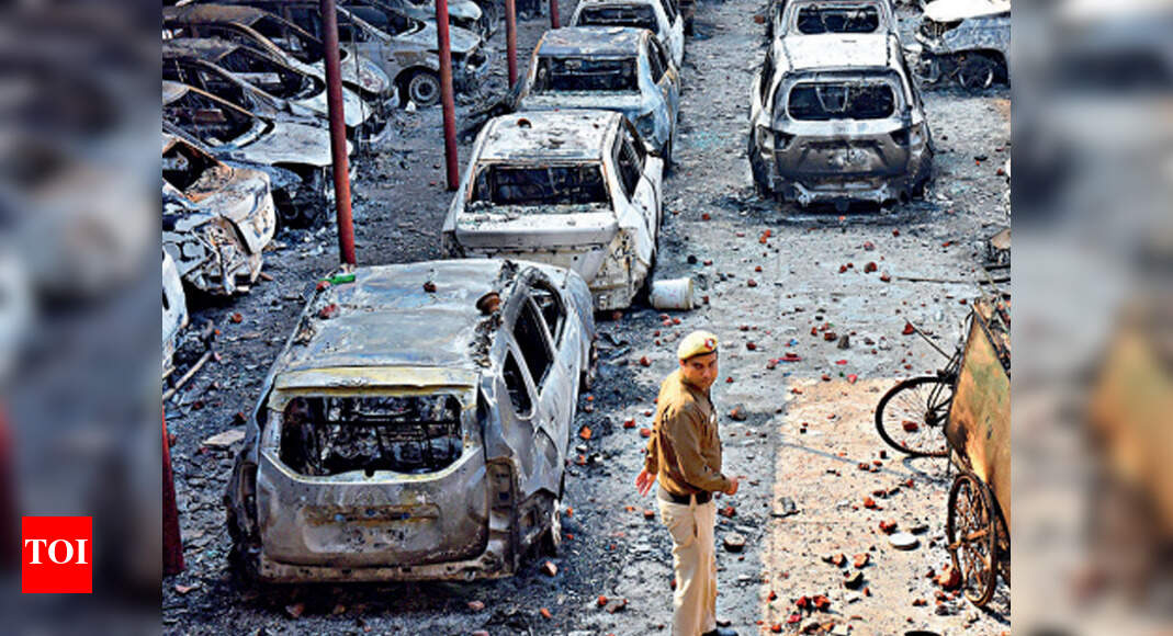 Delhi violence: Vehicle damage from riots covered - Times of India