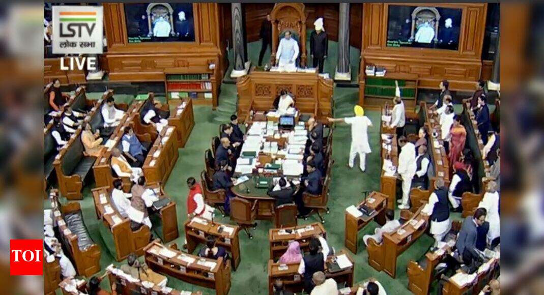 Cong, BJP members push, shove each other in Lok Sabha | India News ...