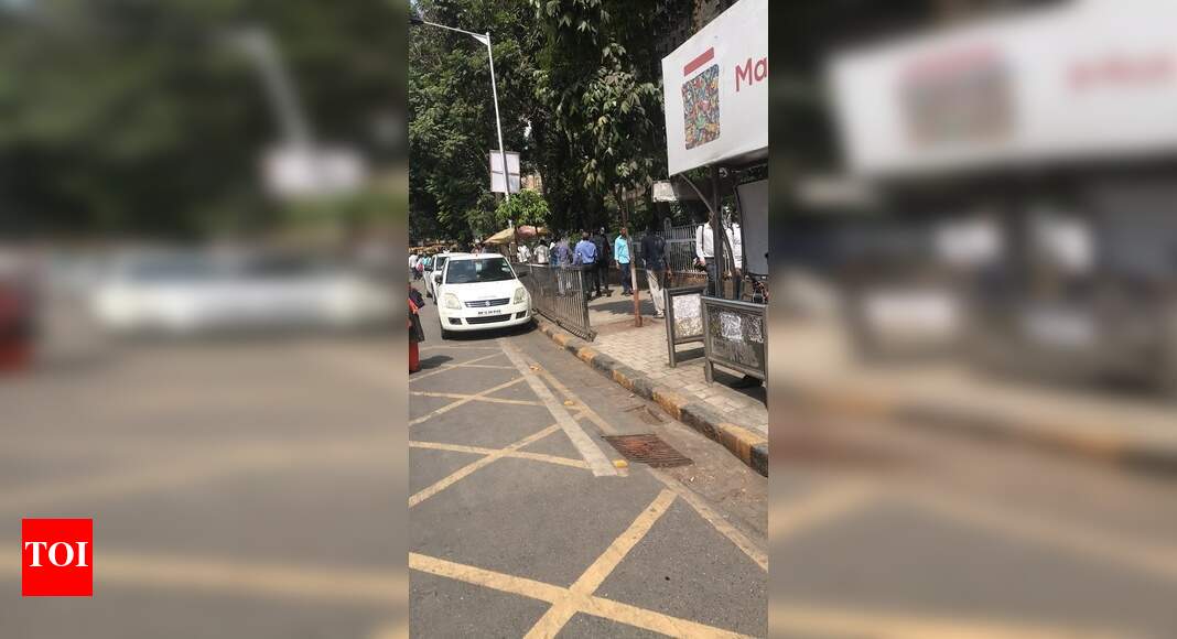 Govt car parked at Bus stop - Times of India