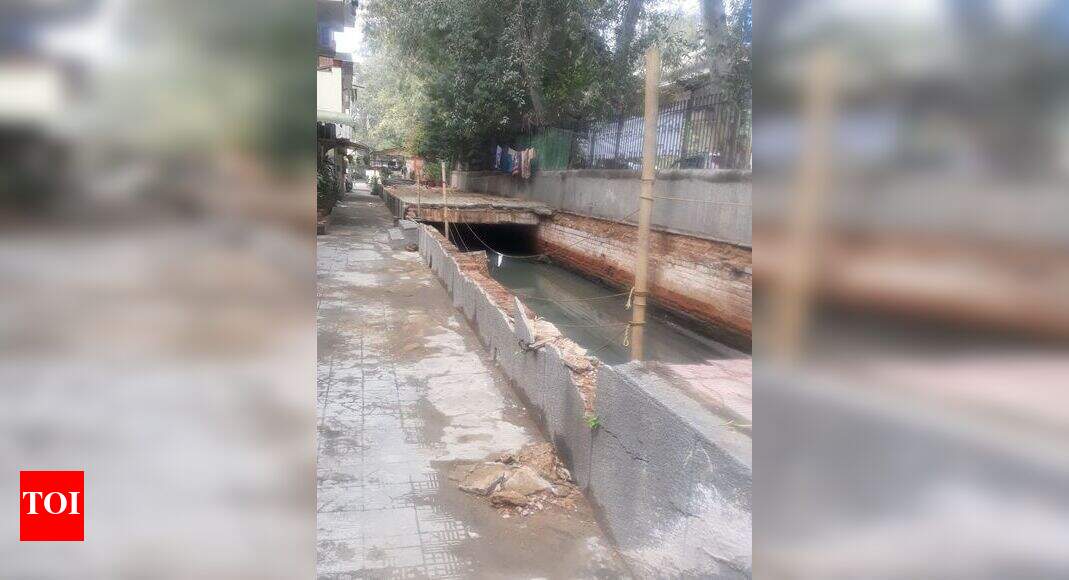 Wide drain left open - Times of India