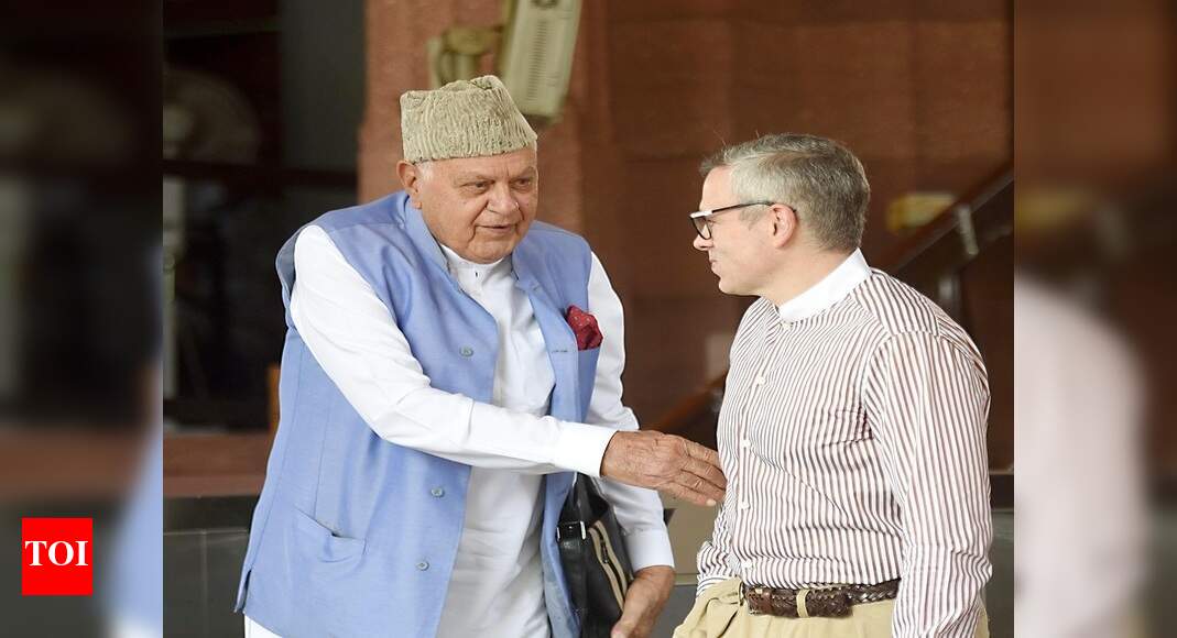 NC chief Farooq Abdullah meets his son Omar Abdullah in sub-jail in ...