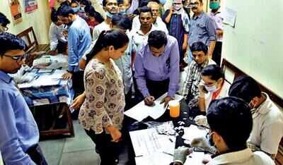 In time of social distancing, VNSGU medicine camp draws crowd of 1,200 ...