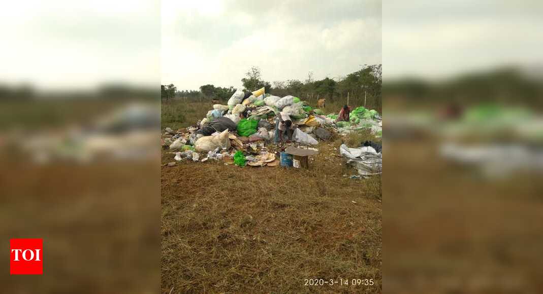 Garbage dumping in approved layout - Times of India