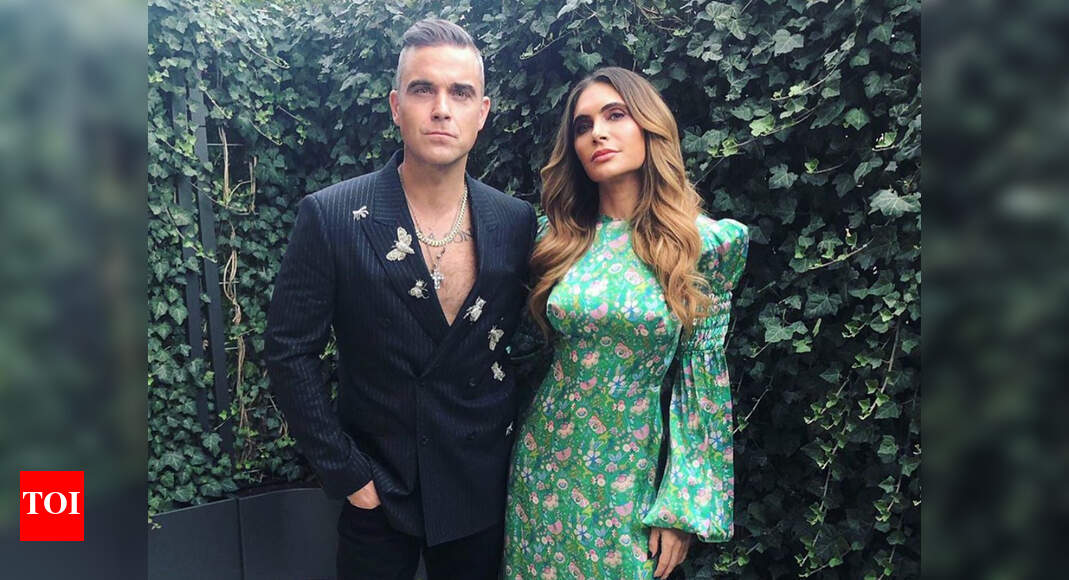 Robbie Williams reunites with family after three-week quarantine ...