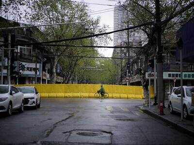 In China, walled up Wuhan awaits life beyond the barricades - The Times ...