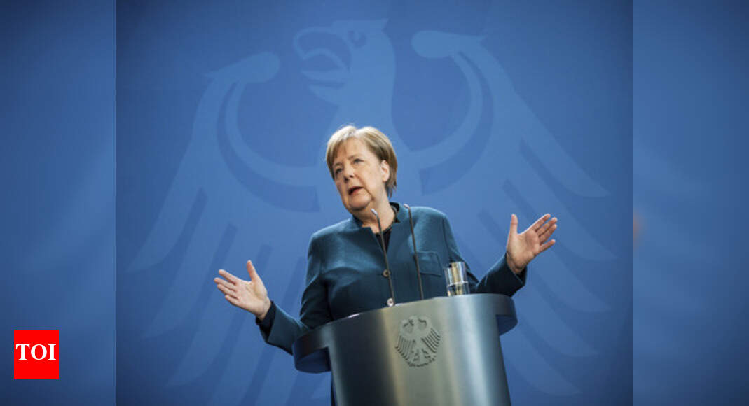 Germany's Angela Merkel returns to office after quarantine stint ...