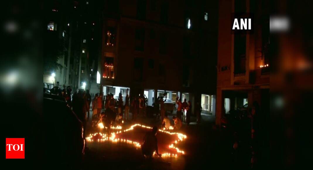 Millions of Indians respond to PM Modi's appeal; light candles, diyas ...