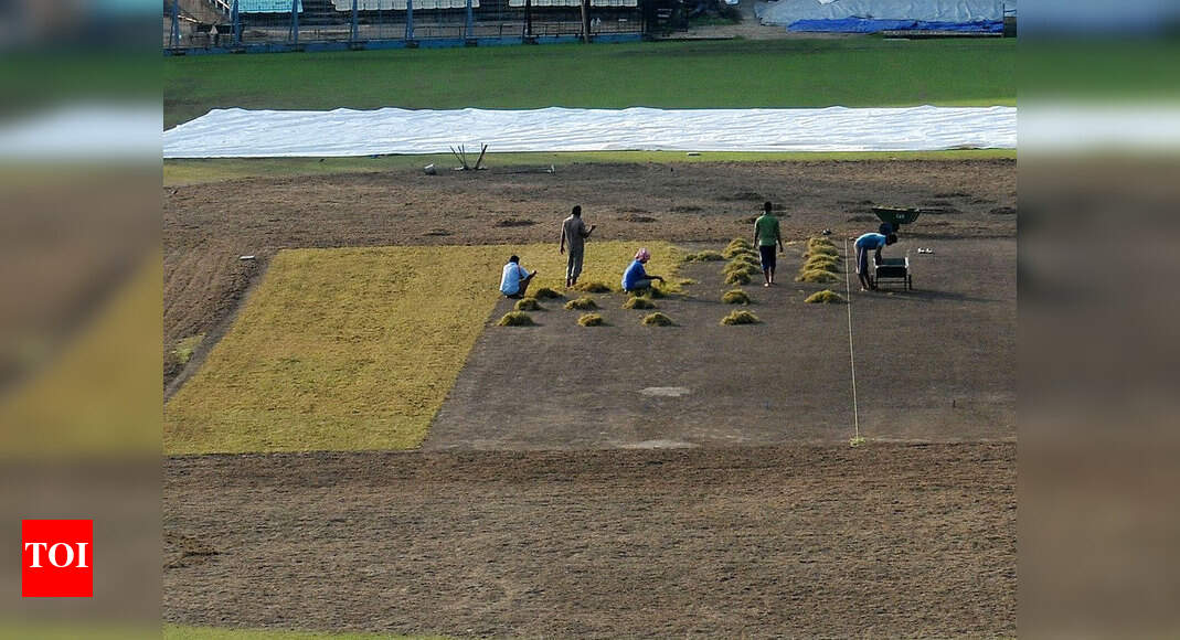 Eden groundsmen maintain social distancing while working on pitch ...