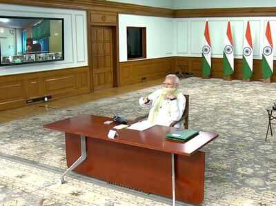 PM Modi again chooses 'gamcha' mask for video-conference with Sarpanchs ...