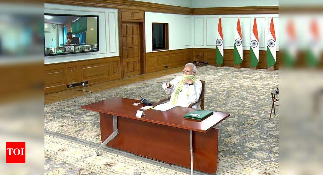 PM Modi again chooses 'gamcha' mask for video-conference with Sarpanchs ...