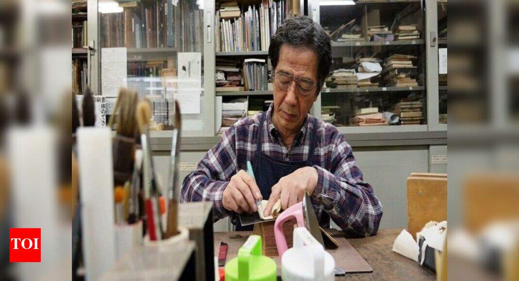 Japanese craftsman skillfully restores old books - Times of India