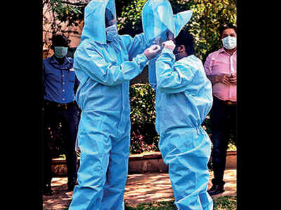Ahmedabad: In stuffy and hot PPE, they shield you from Covid-19 heat ...
