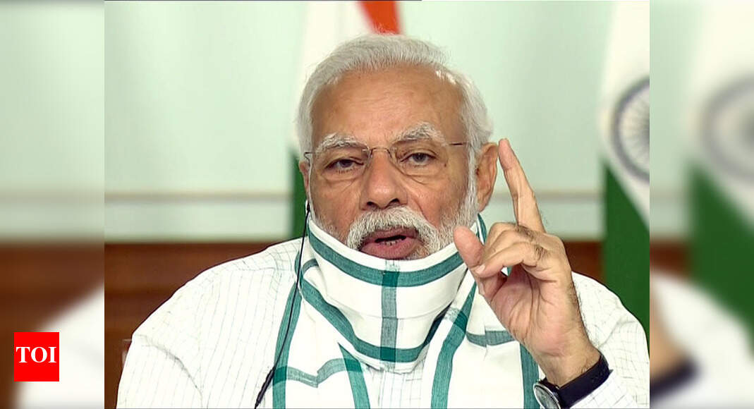 Narendra Modi: PM Modi's popularity soars amid India's Covid fight ...
