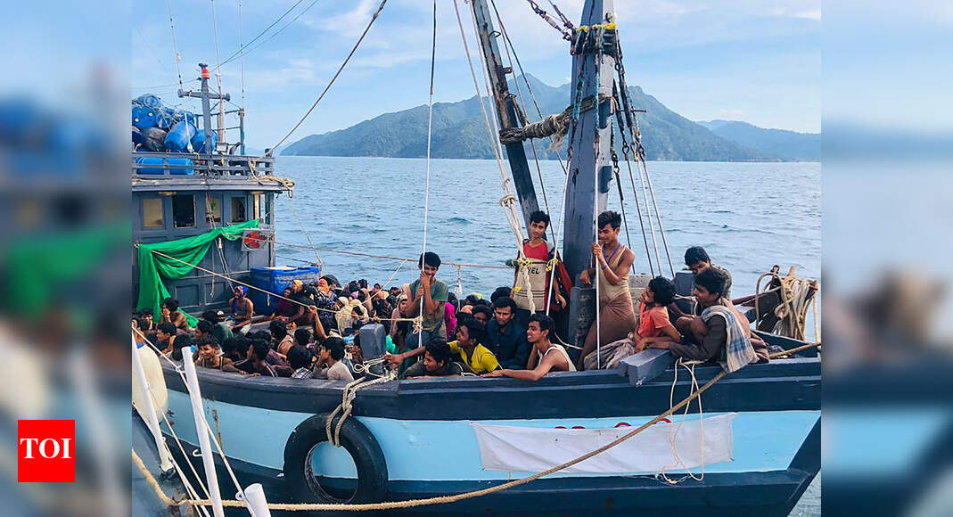 Rohingya refugees floating at sea land on Bangladesh island - Times of ...