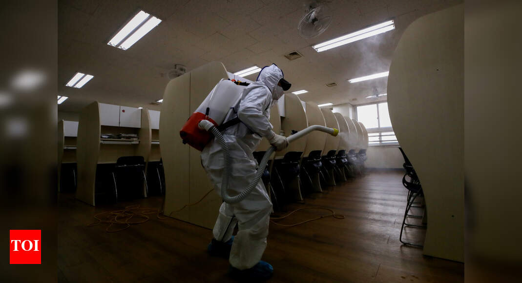 Coronavirus symptoms multiply as pandemic deepens - Times of India