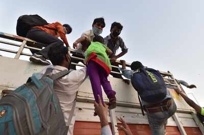 SC asks searching questions to Centre over migrant workers crisis | India News - Times of India