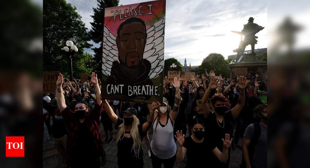 Convulsing in protest, US cities brace for more unrest - Times of India