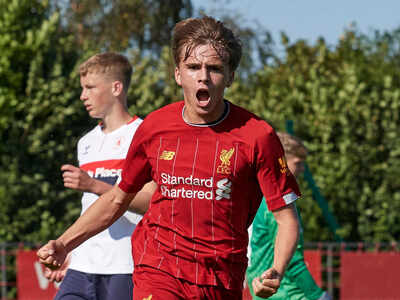 Liverpool: James Norris signs first professional contract with ...