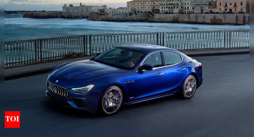Maserati: Maserati teases arrival of Ghibli Hybrid - Times of India