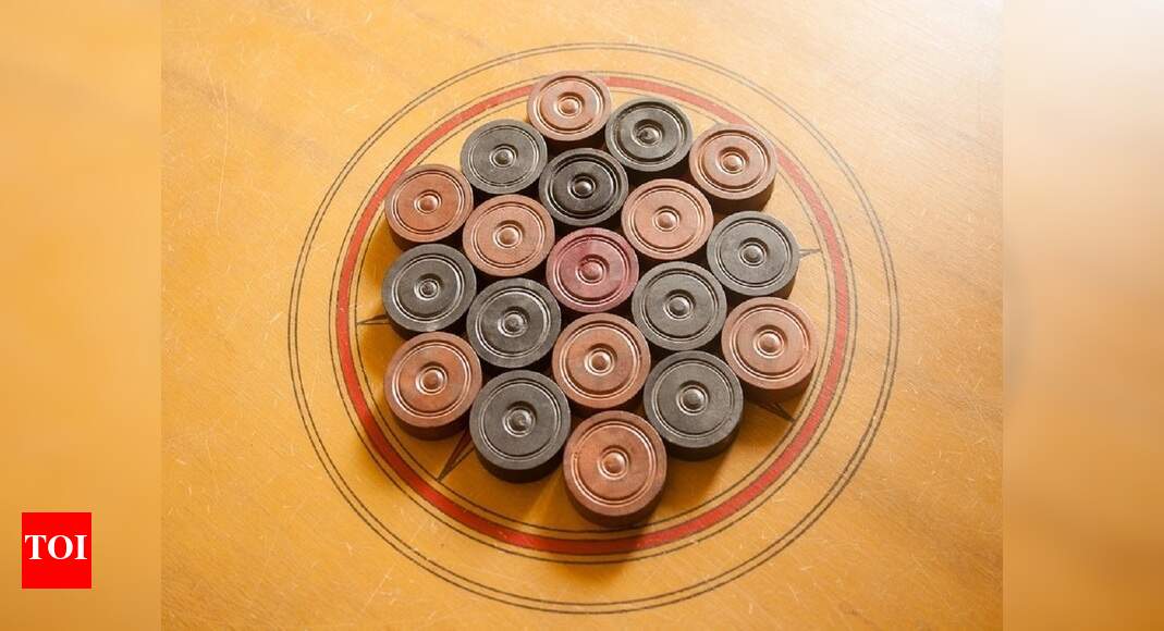Carrom striker and coins to enjoy your indoor game with amazement ...