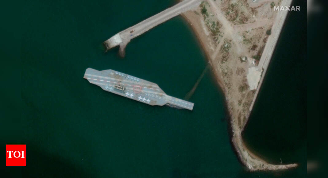 Amid US tension, Iran builds fake aircraft carrier to attack - Times of India