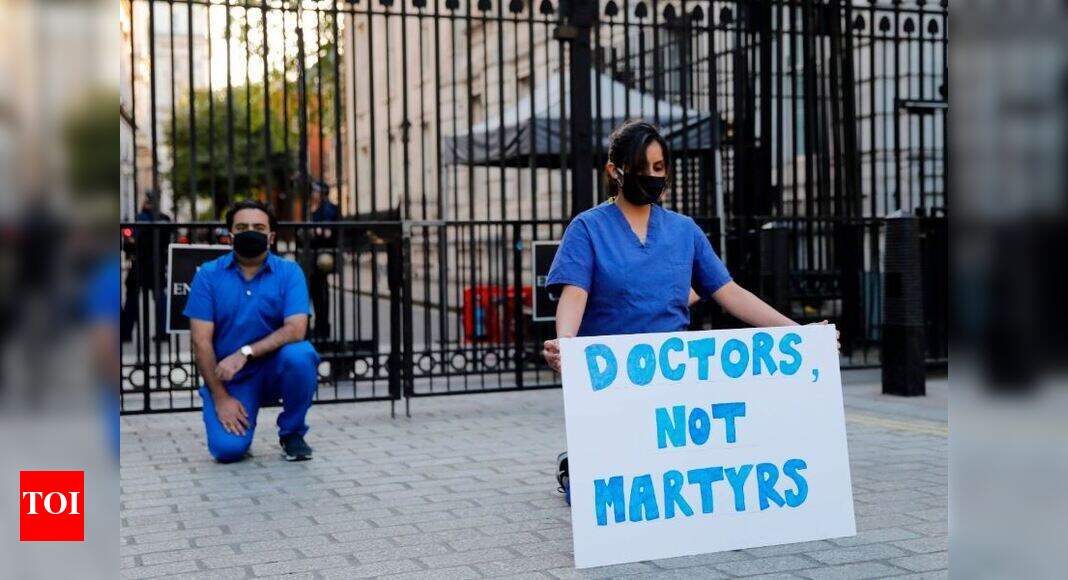 Indian-origin doctor couple begin legal battle with UK govt - Times of ...