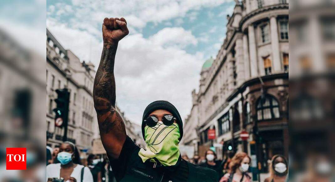 Lewis Hamilton: Lewis Hamilton marches in 'really moving' London anti ...