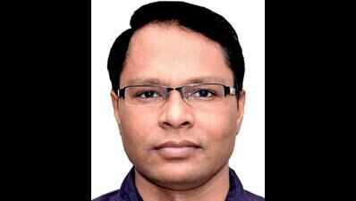 Doctor fights off Covid to treat 4,000 others | Surat News - Times of India