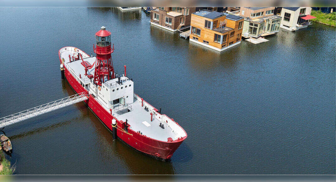 This is a floating hotel in Amsterdam housed inside a lightship ...