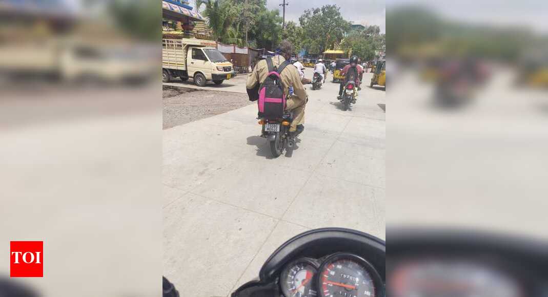 Pillion Rider without Helmet - Times of India