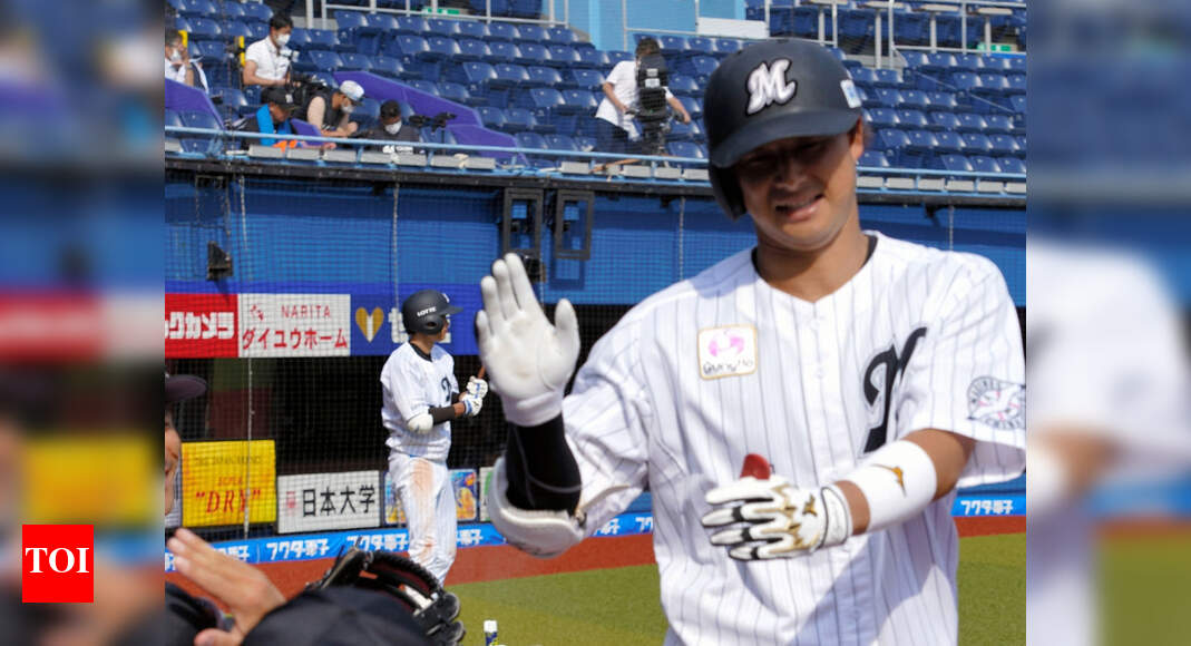 Ignoring virus spike, Japan baseball fans flood back to stadiums | More ...