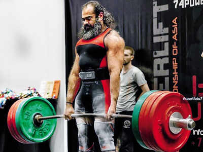 Bengaluru: Powerlifting champ shoulders burden of last rites of Covid ...