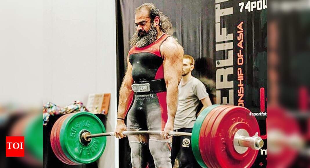 Powerlifting champ shoulders burden of Covid last rites | Bengaluru ...
