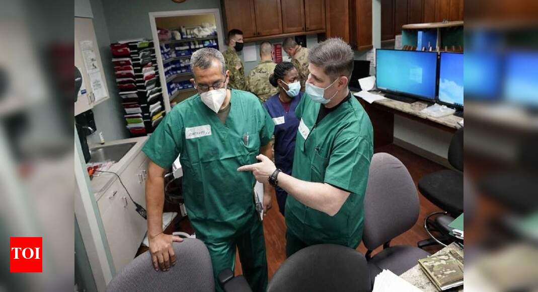 Coronavirus patients swamp emergency rooms in some US states - Times of ...