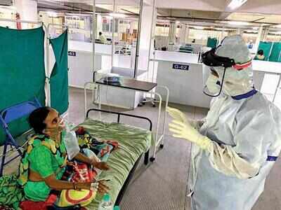 Forest officer pays surprise visit to SMIMER in PPE kit | Surat News ...