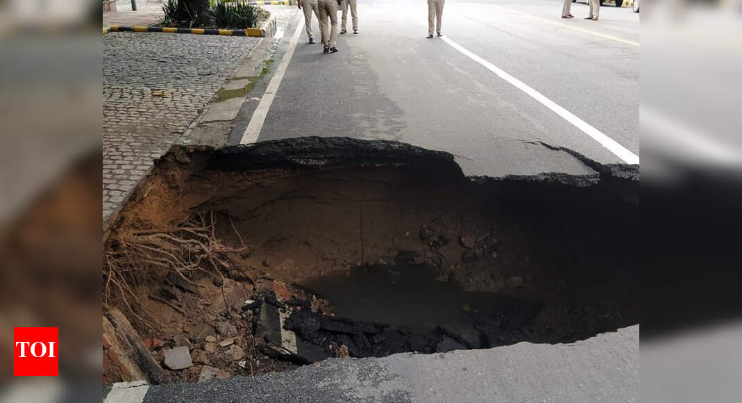 Roads cave in at two prime locations in Delhi | Delhi News - Times of India