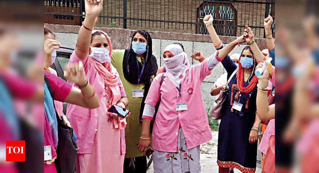 ASHA workers on strike for better pay in Delhi | Delhi News - Times of ...