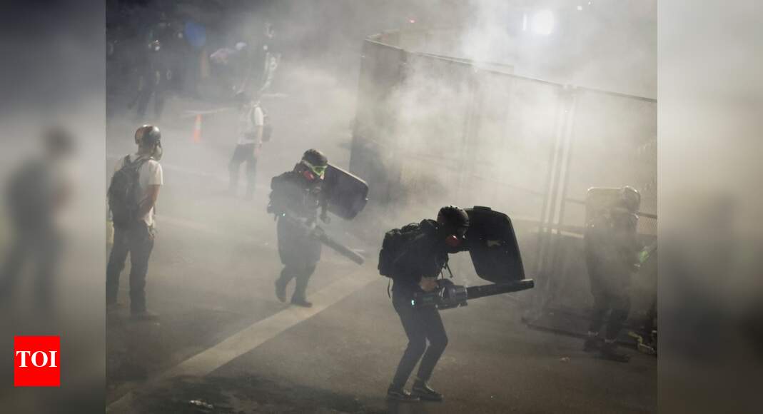 US agents use gas, flash bangs to clear Portland protesters - Times of ...
