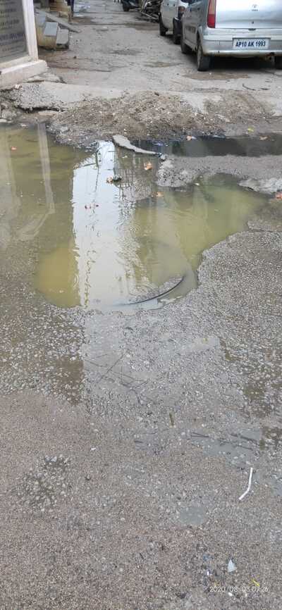 Drainage Overflow from Week with Pot holes - Times of India