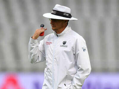 ICC speaks to umpire Richard Kettleborough after he steps on field ...