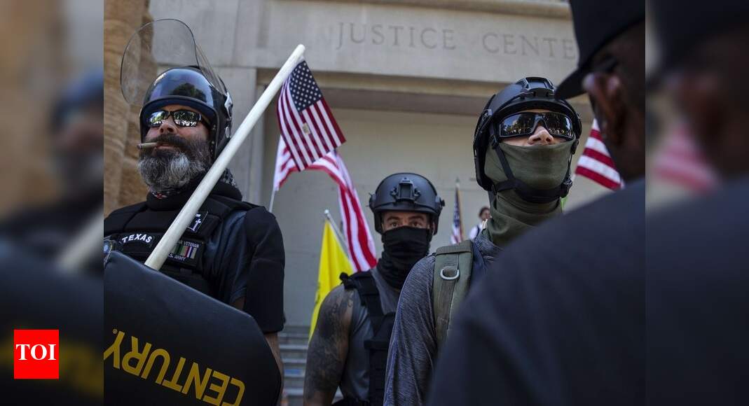 Portland police declare riot, push protesters from building - Times of ...